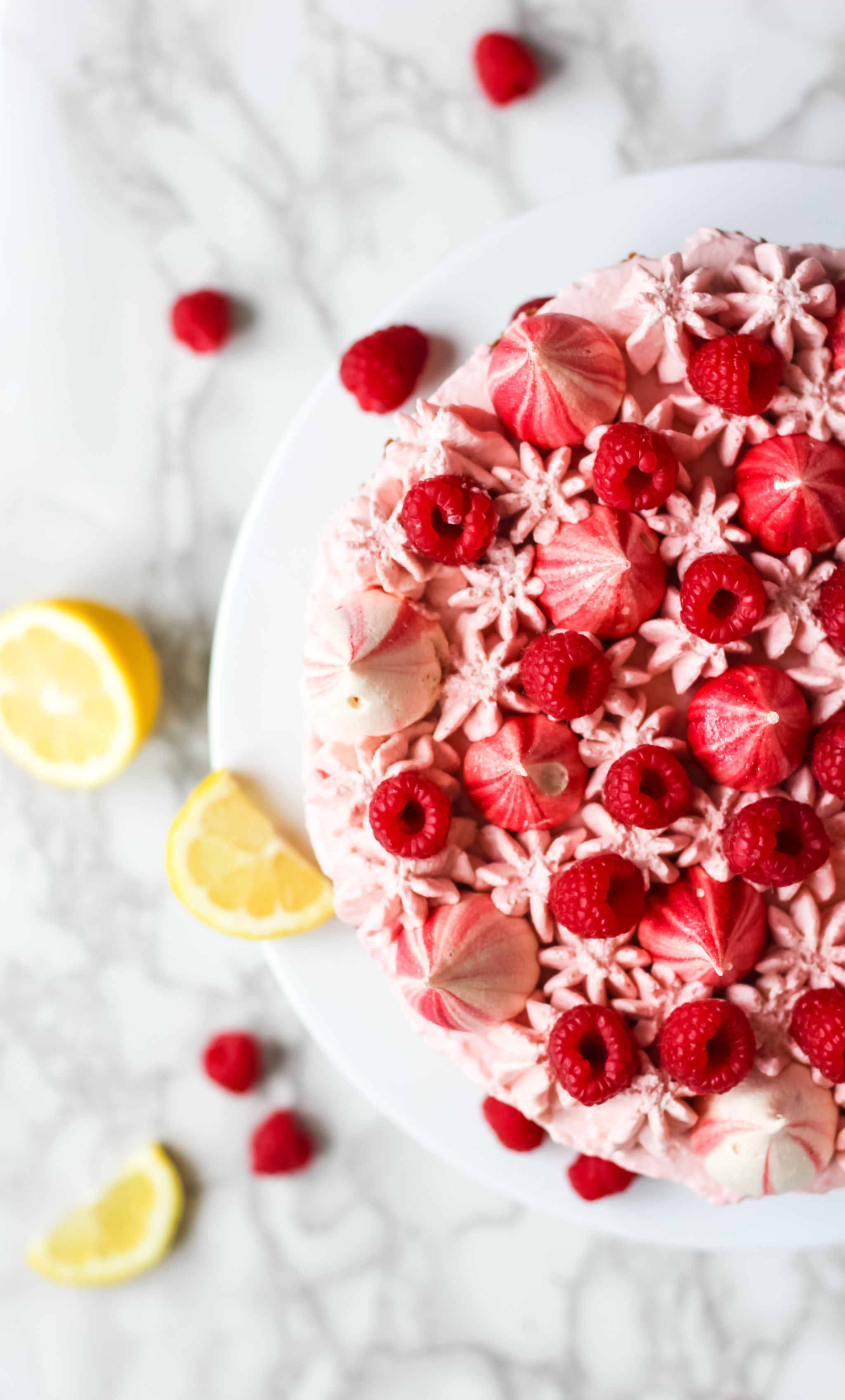 Lemon Raspberry Cream Cake with Meringue Kisses - Baker Jo